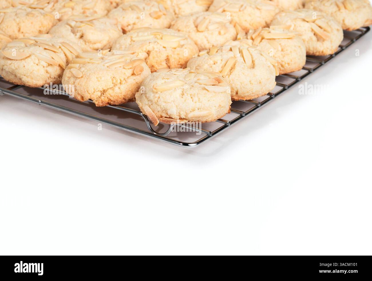 Baked almond flour cookies on cooling rack. Gluten free unbaked raw ...