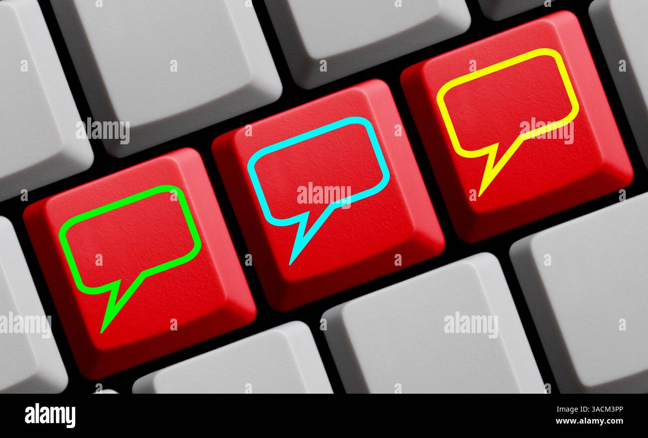 Three speech bubble symbols on computer keyboard Stock Photo - Alamy