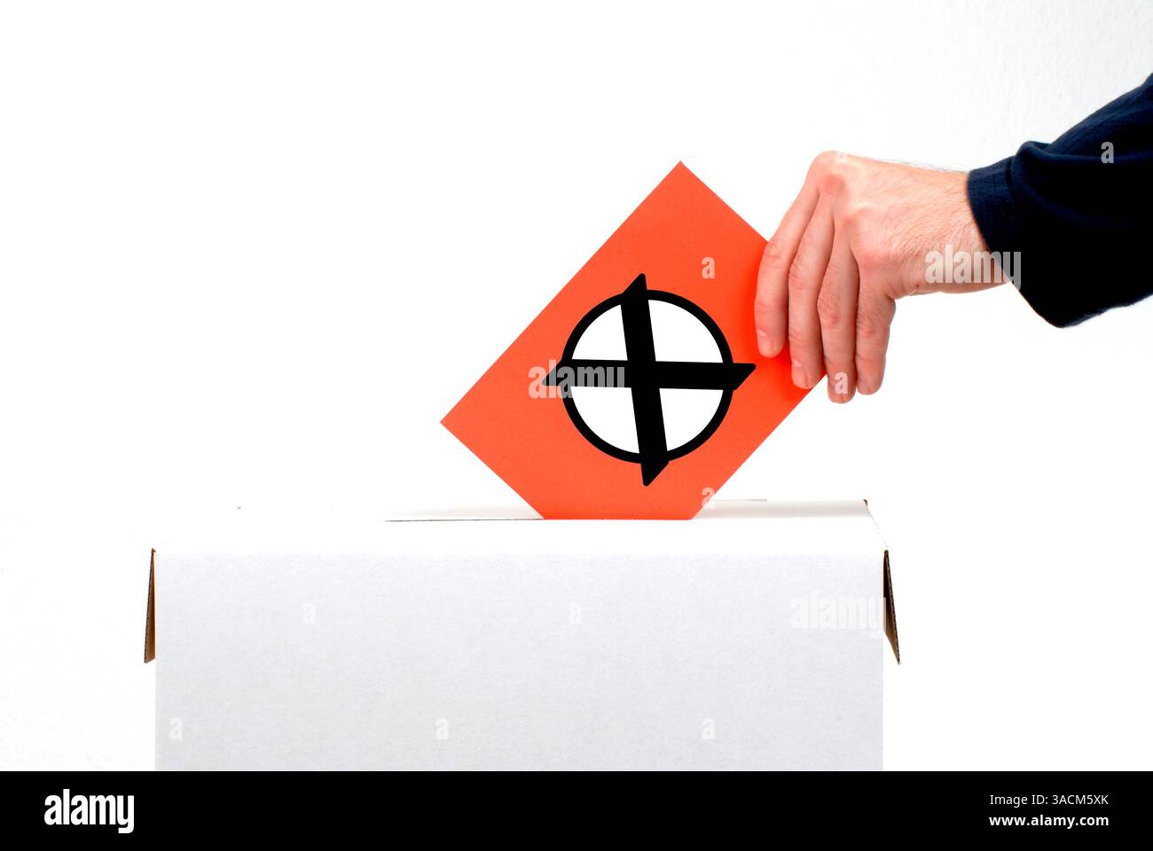Hand throws ballot paper into ballot box hi-res stock photography and ...