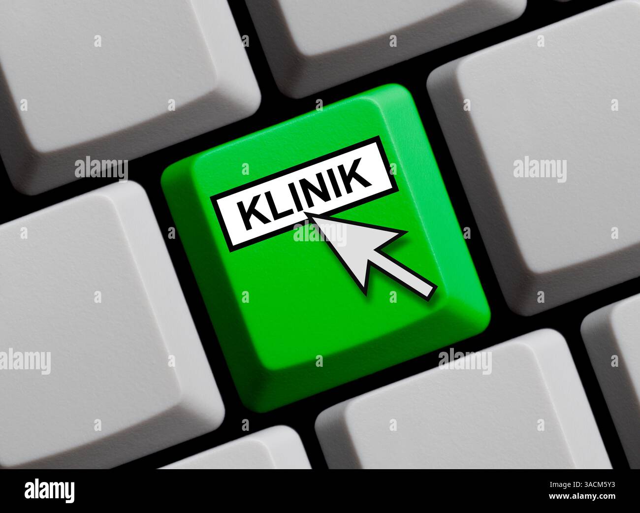 Colored key of computer keyboard with mouse arrow shows clinic hi-res ...