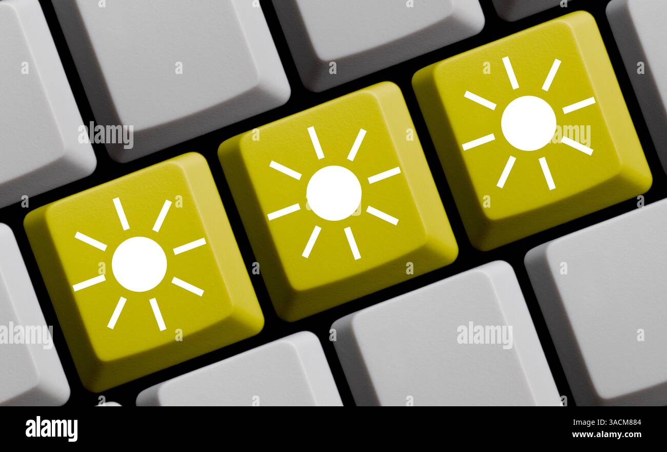 Yellow keyboard with three buttons shows summer sunshine Stock Photo ...
