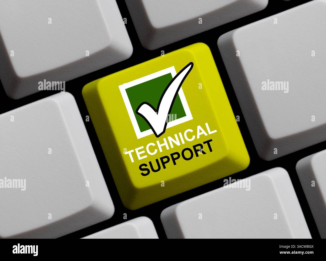 Yellow computer keyboard with tick symbol indicates Technical Support ...