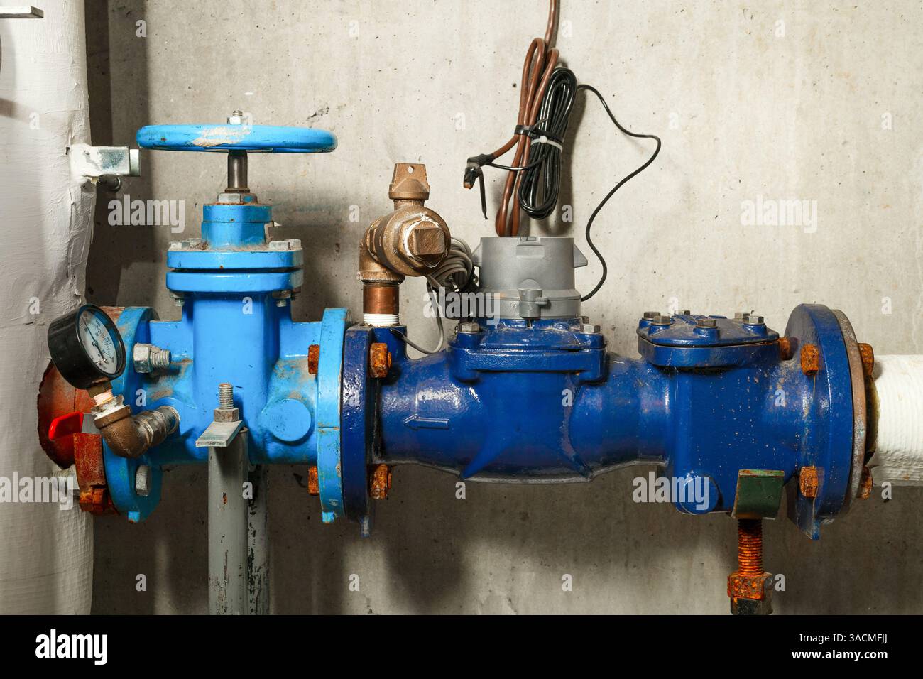 Water meter in building with commercial and residential units. Digital ...