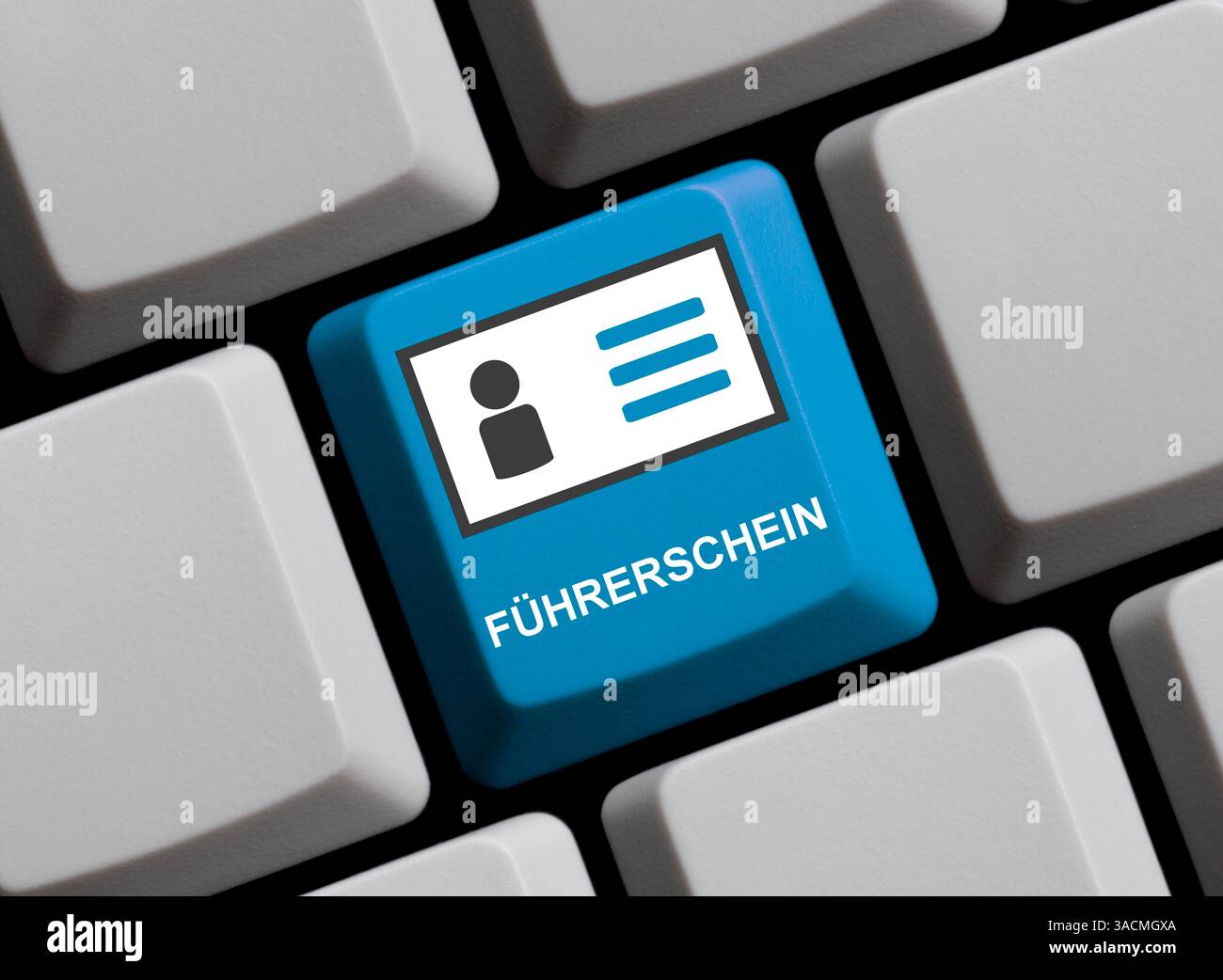Blue computer keyboard shows apply for driver's license online Stock ...