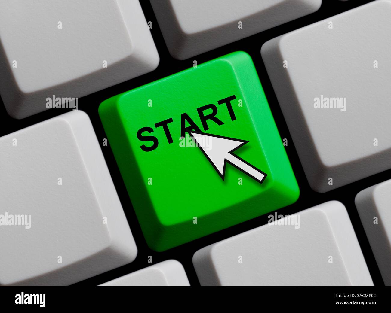 Computer keyboard with mouse arrow showing start hi-res stock ...