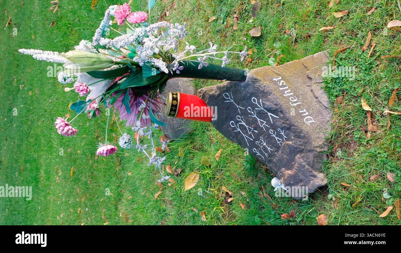 Gravestone with inscription: "You are missing" and stick figure as ...