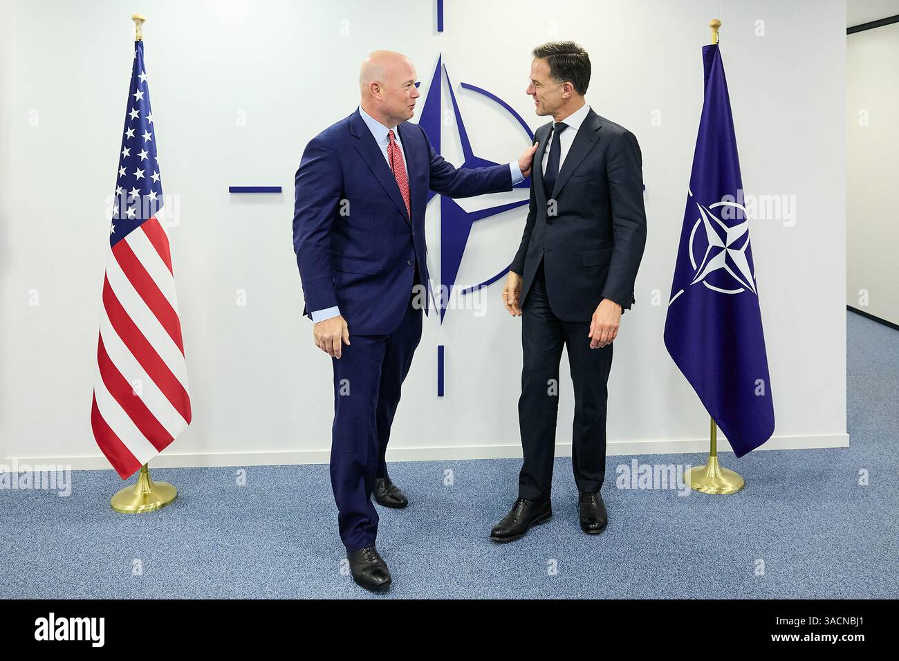 NATO Secretary General Mark Rutte (R) and United States Ambassador to ...