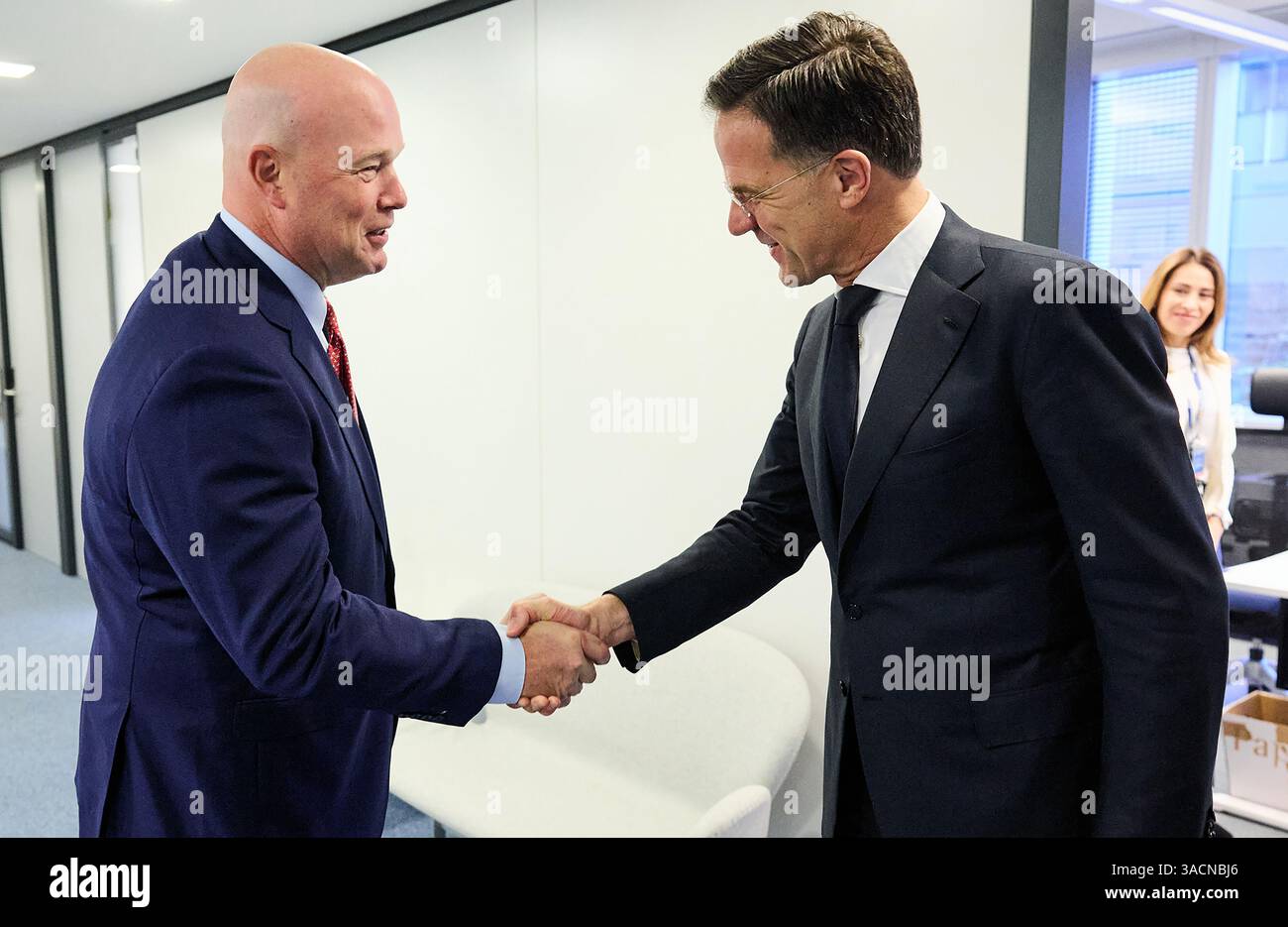 NATO Secretary General Mark Rutte (R) and United States Ambassador to ...