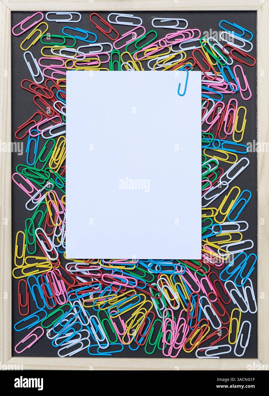 Background with colorful paper clips and paper with text space Stock ...