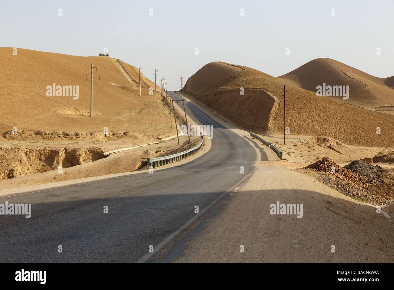 Endless road through the arid landscape of Faryab Province in ...