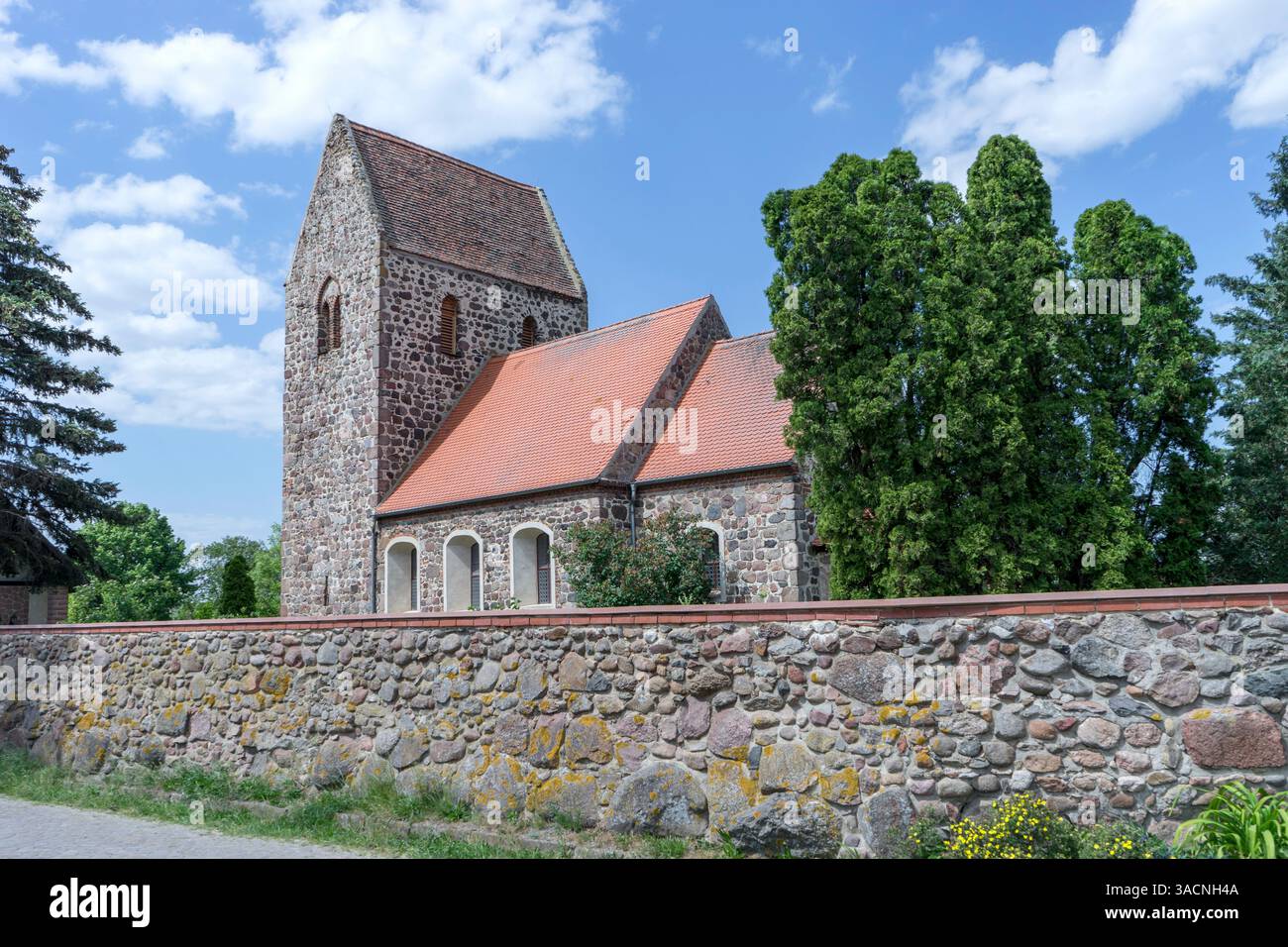 Romanesque village church made of fieldstones with wall in Gohre ...