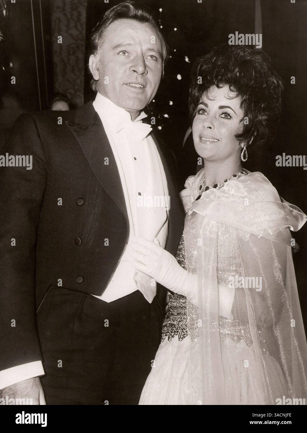 Richard Burton and Elizabeth Taylor attend the Royal Film Performance ...