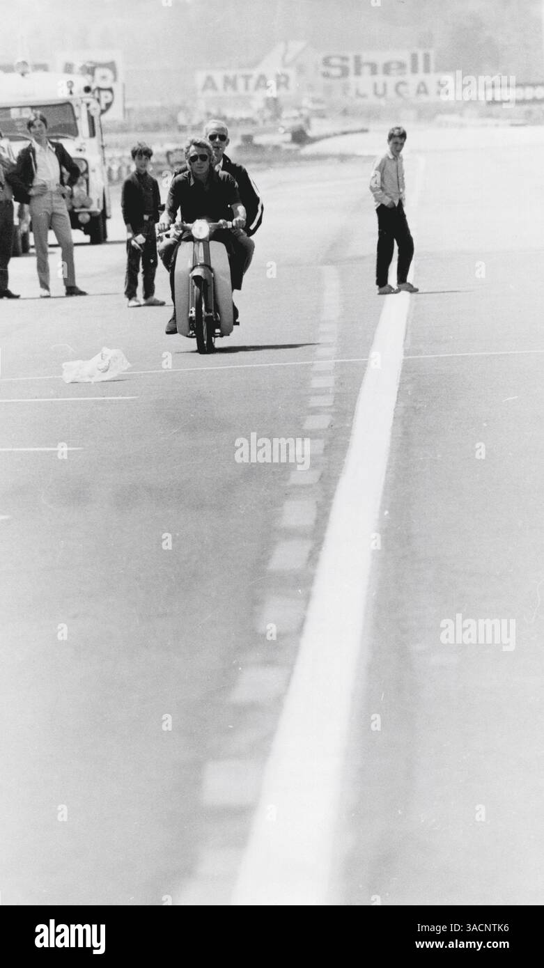 Steve McQueen indulging in one of his favorite pastimes, riding a ...