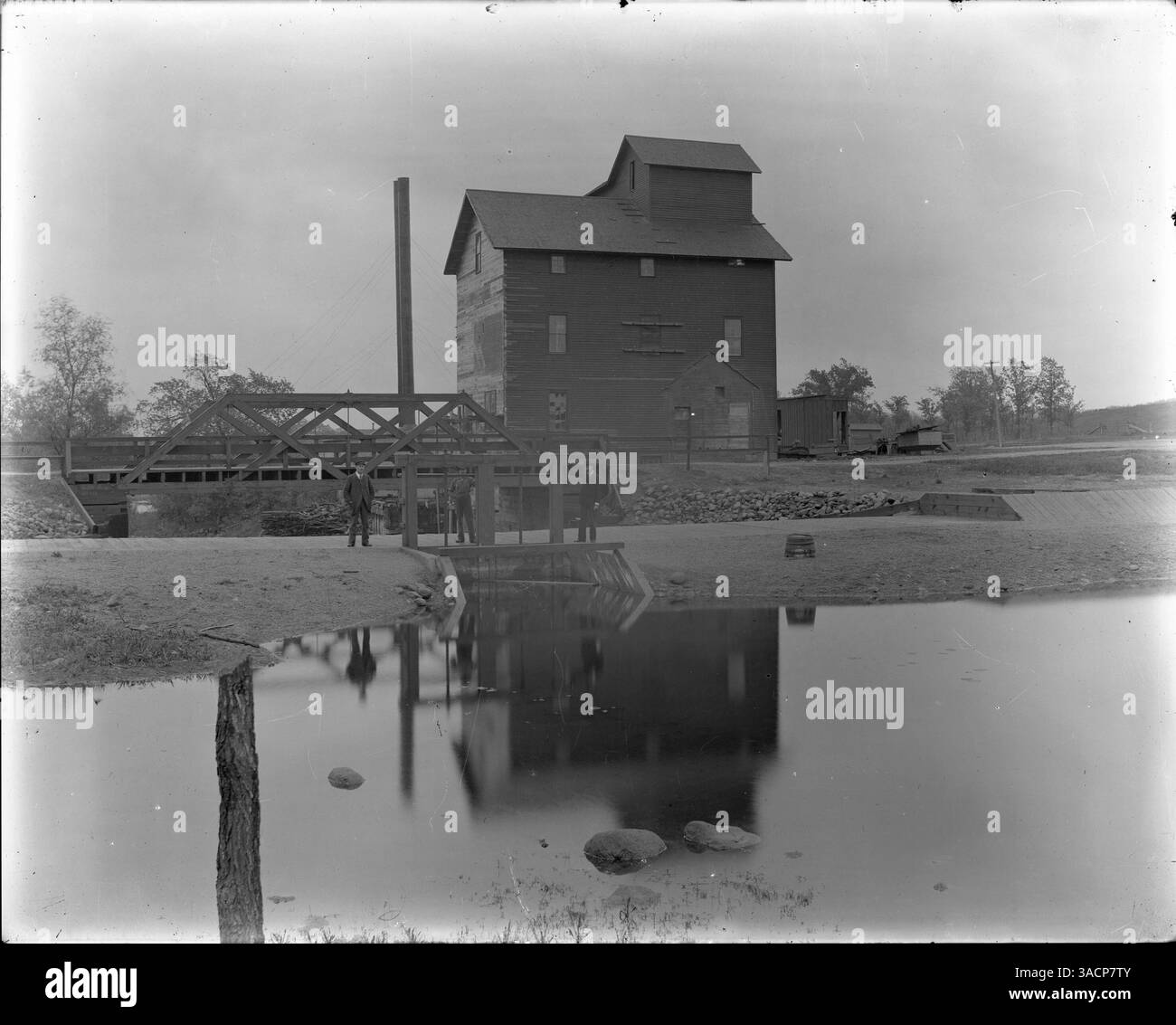 A grain elevator at Minnetonka Mills features a small dam and sluice ...