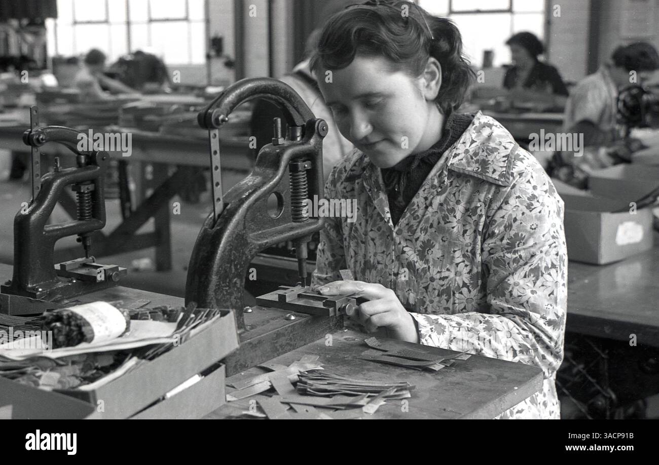 1930s, historical, a young woman wearing a flower patterned work ...