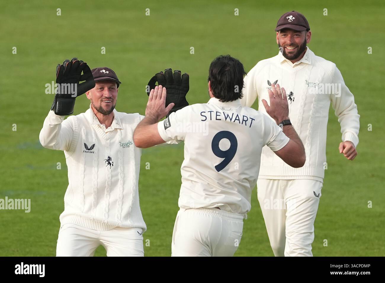 Kent's Grant Stewart celebrates with wicketkeeper Harry Finch (left ...