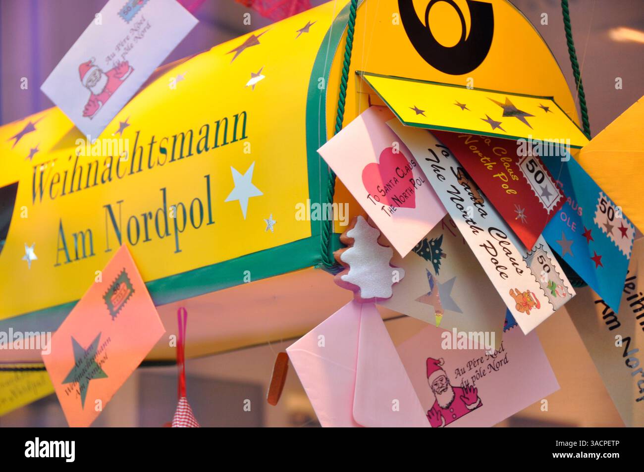 Yellow letterbox with lots of letters for santa claus hi-res stock ...