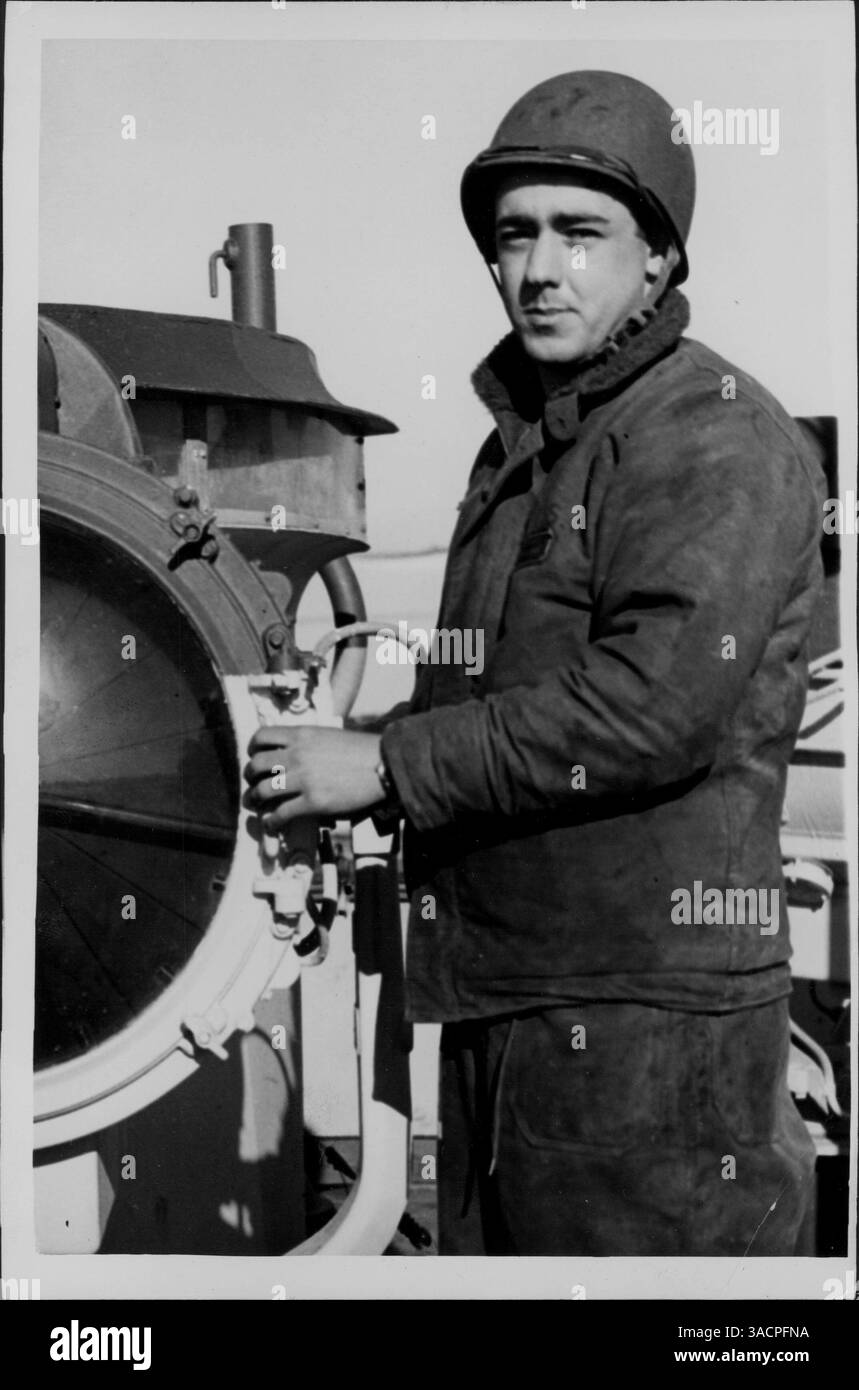 Coast Guardsman John E. Perry, a seaman first class, serves aboard a ...