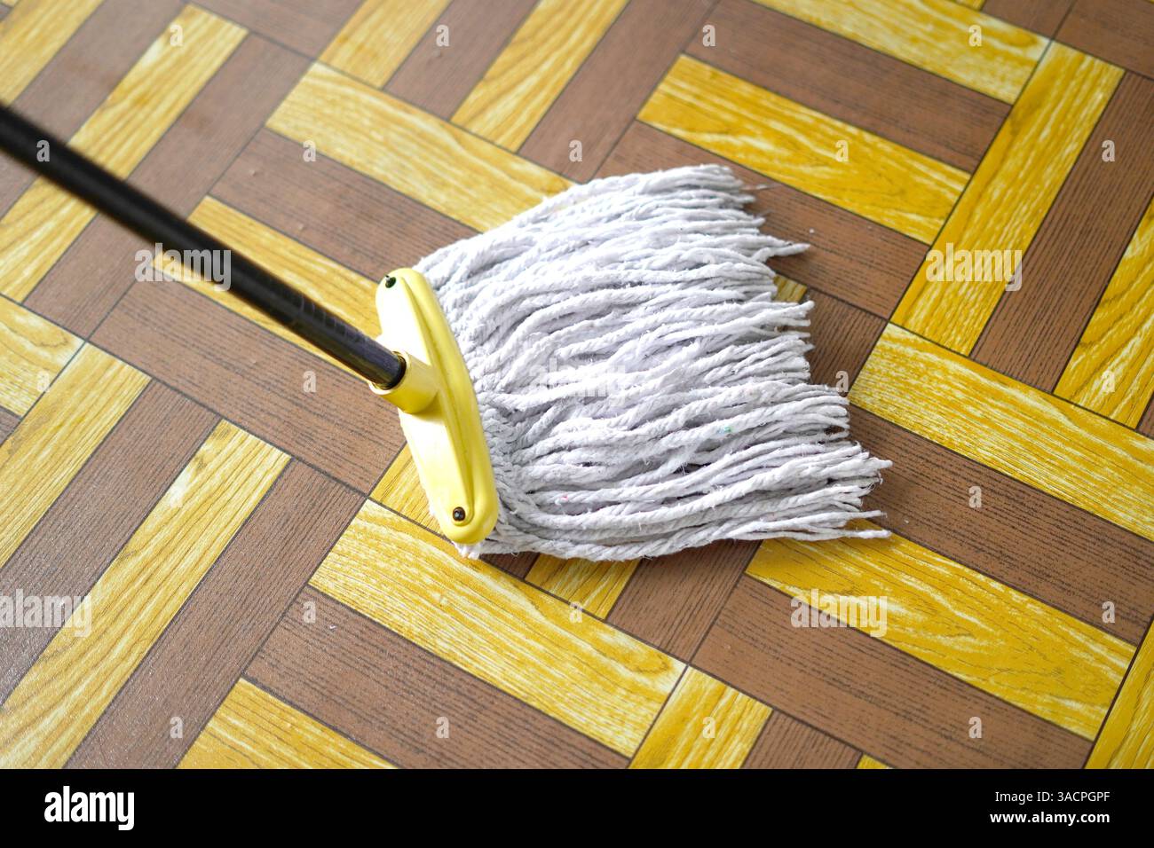 mob on a wooden floor Stock Photo - Alamy