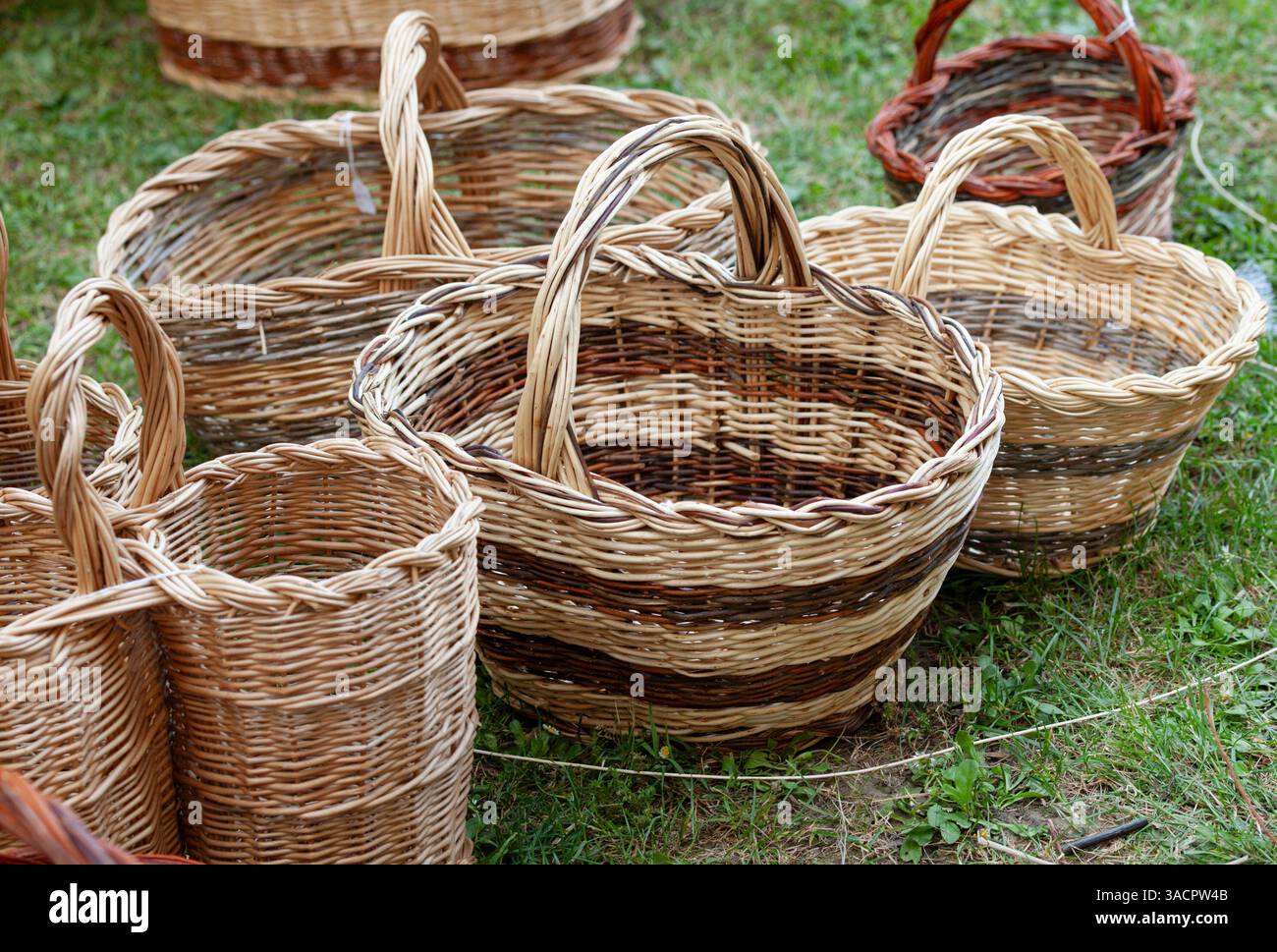 Wicker baskets of different shapes and sizes, handcrafted with ...