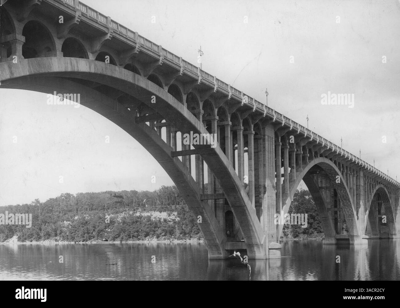 This photograph shows the Ford Bridge, which opened in July 1927, from ...