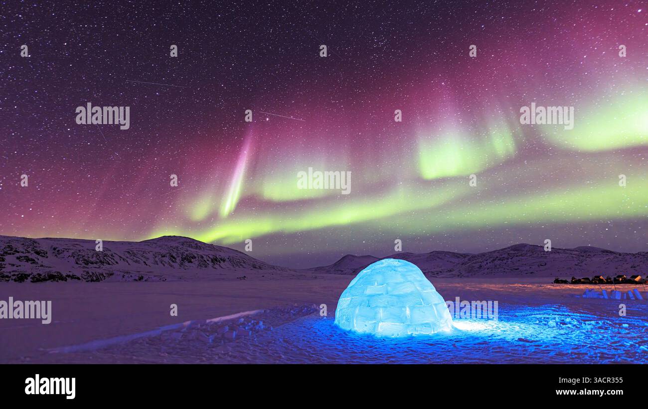 Aurora Borealis, Northern Lights, and stars over snow and mountains of ...