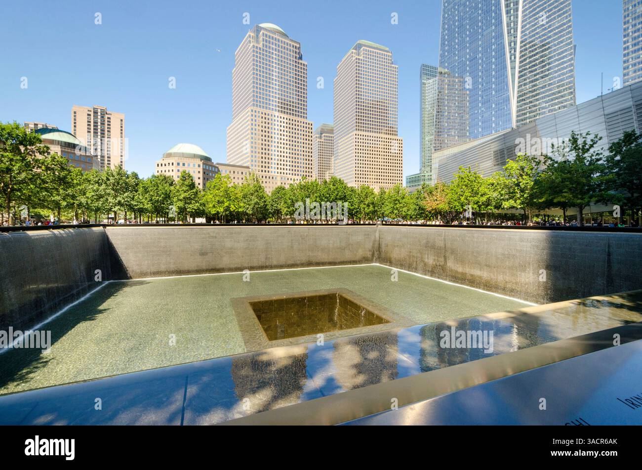 Reflections in the pool of the September 11 Memorial Stock Photo - Alamy