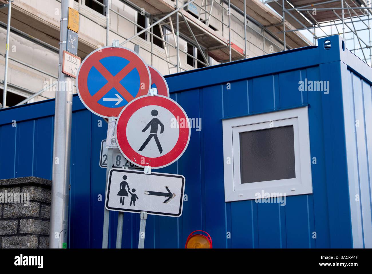 Construction site containers and signage Stock Photo - Alamy