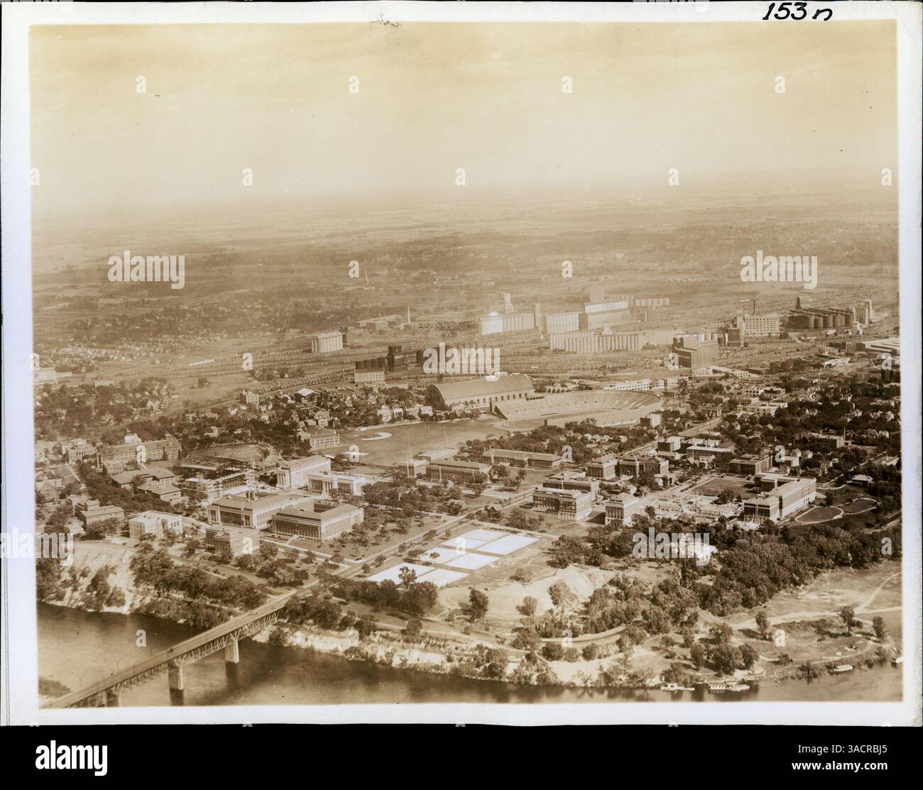 An aerial view looking northeast over the Mississippi River showing the ...