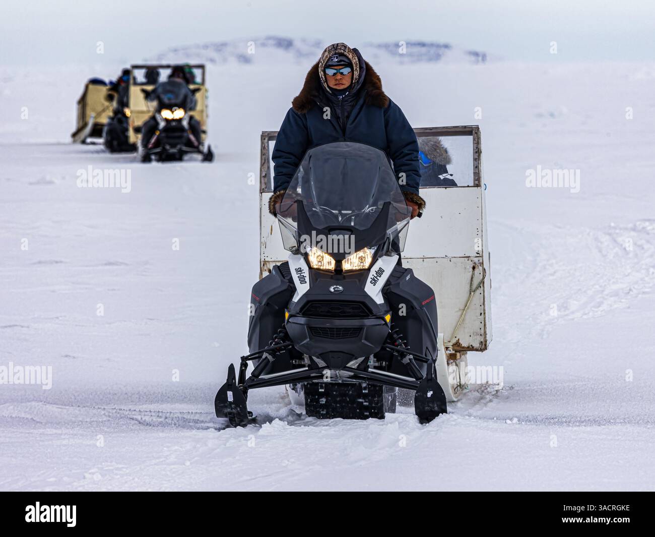 Snowmobile inuit hi-res stock photography and images - Alamy