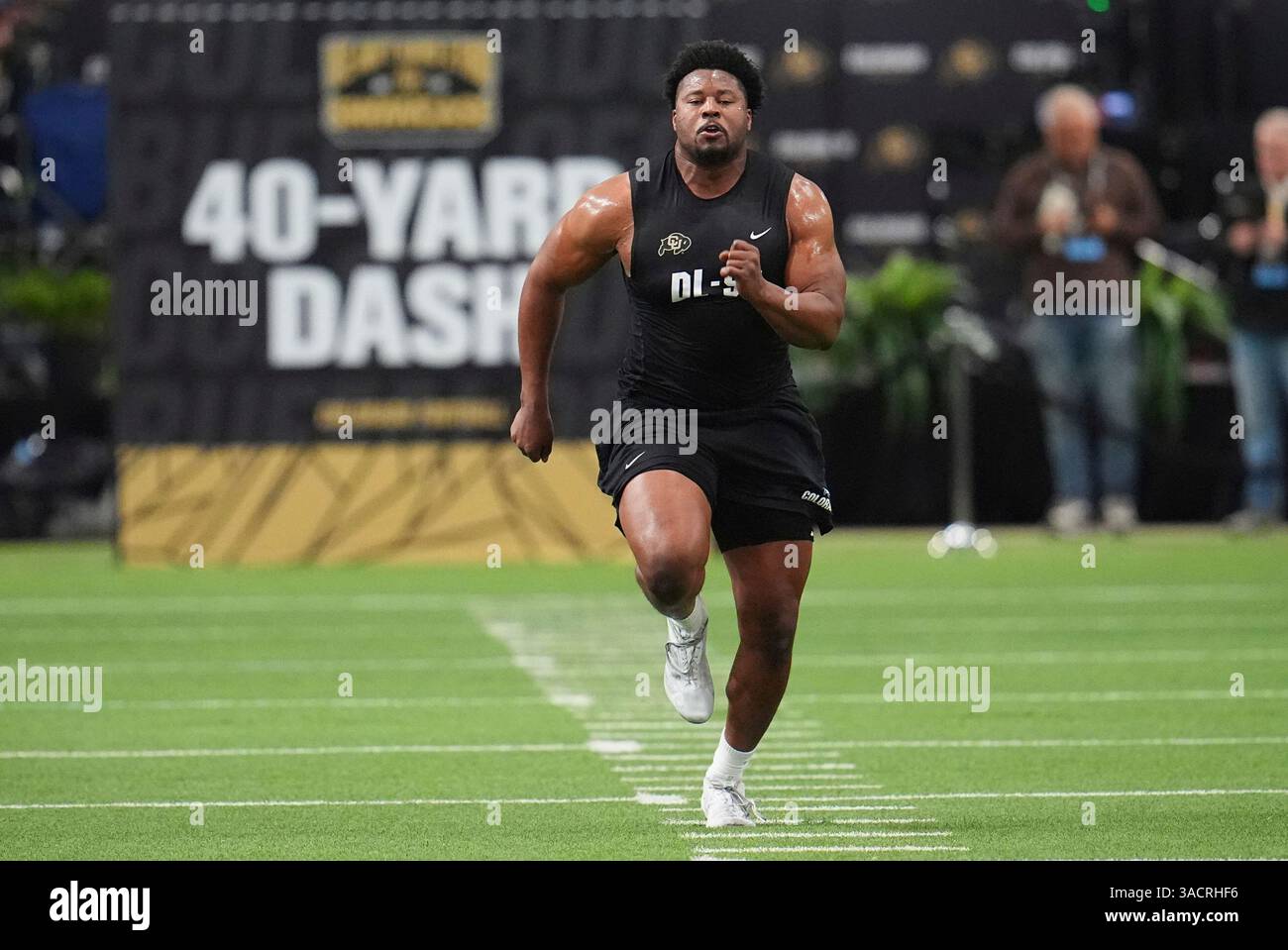 Colorado defensive lineman Shane Cokes runs the 40-yard dash during ...