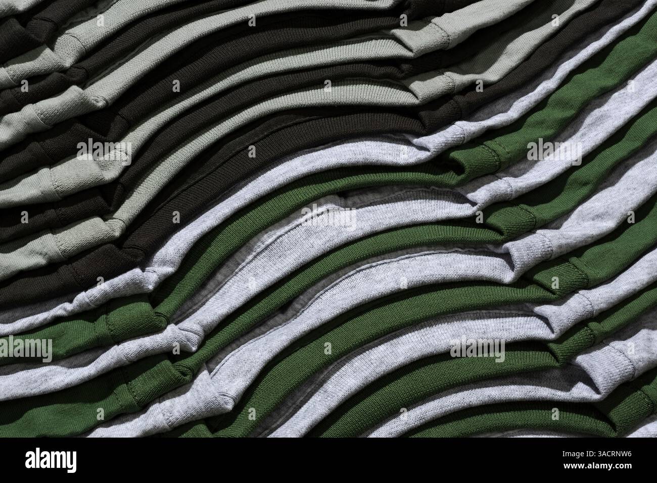 T-shirt collar collection - stack display Stock Photo - Alamy