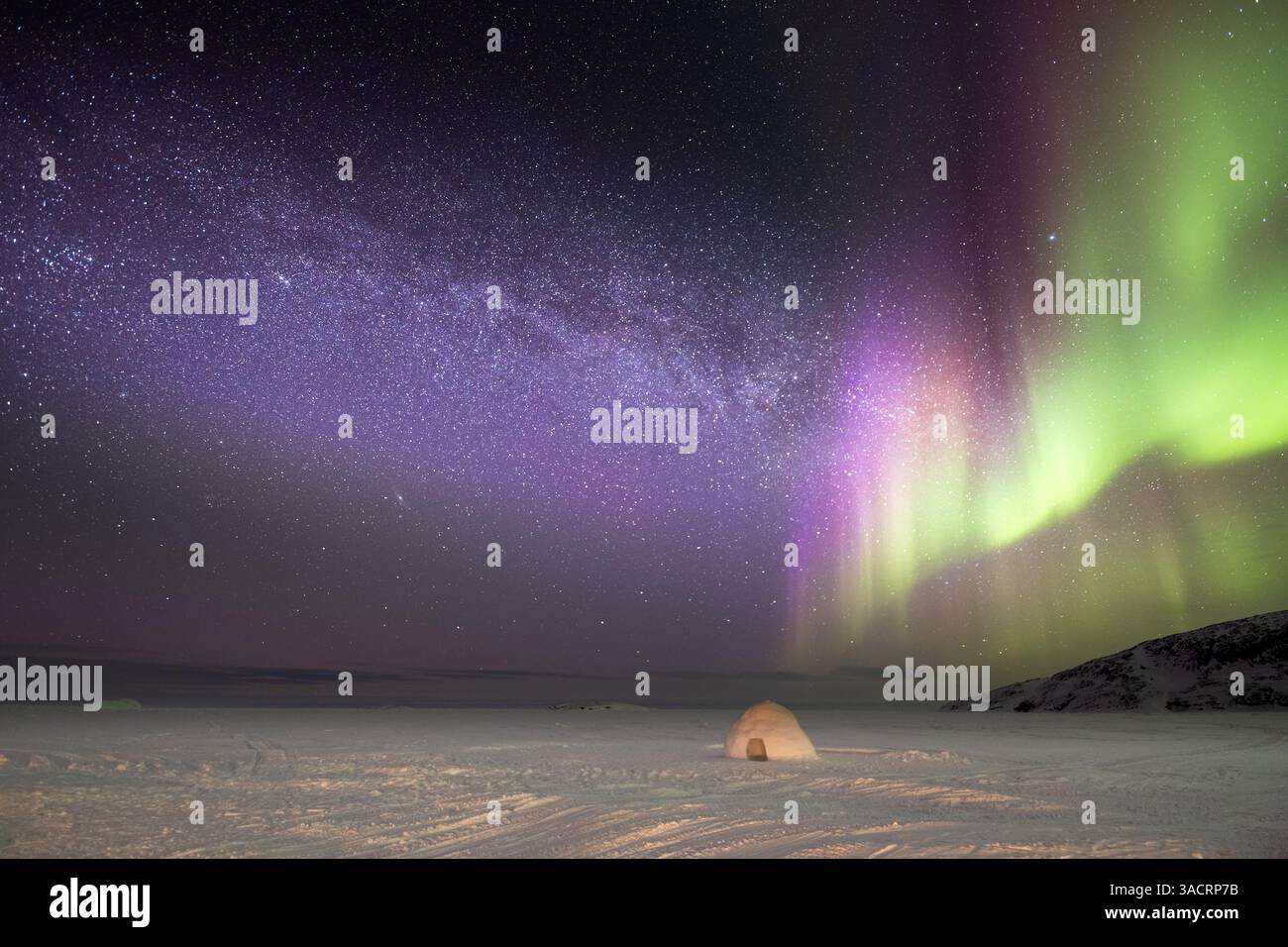 Aurora Borealis, Northern Lights, and the Milky Way over snow and ...