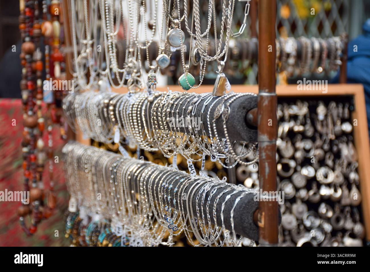 Handmade artisanal jewelry and accessories on display at a street ...