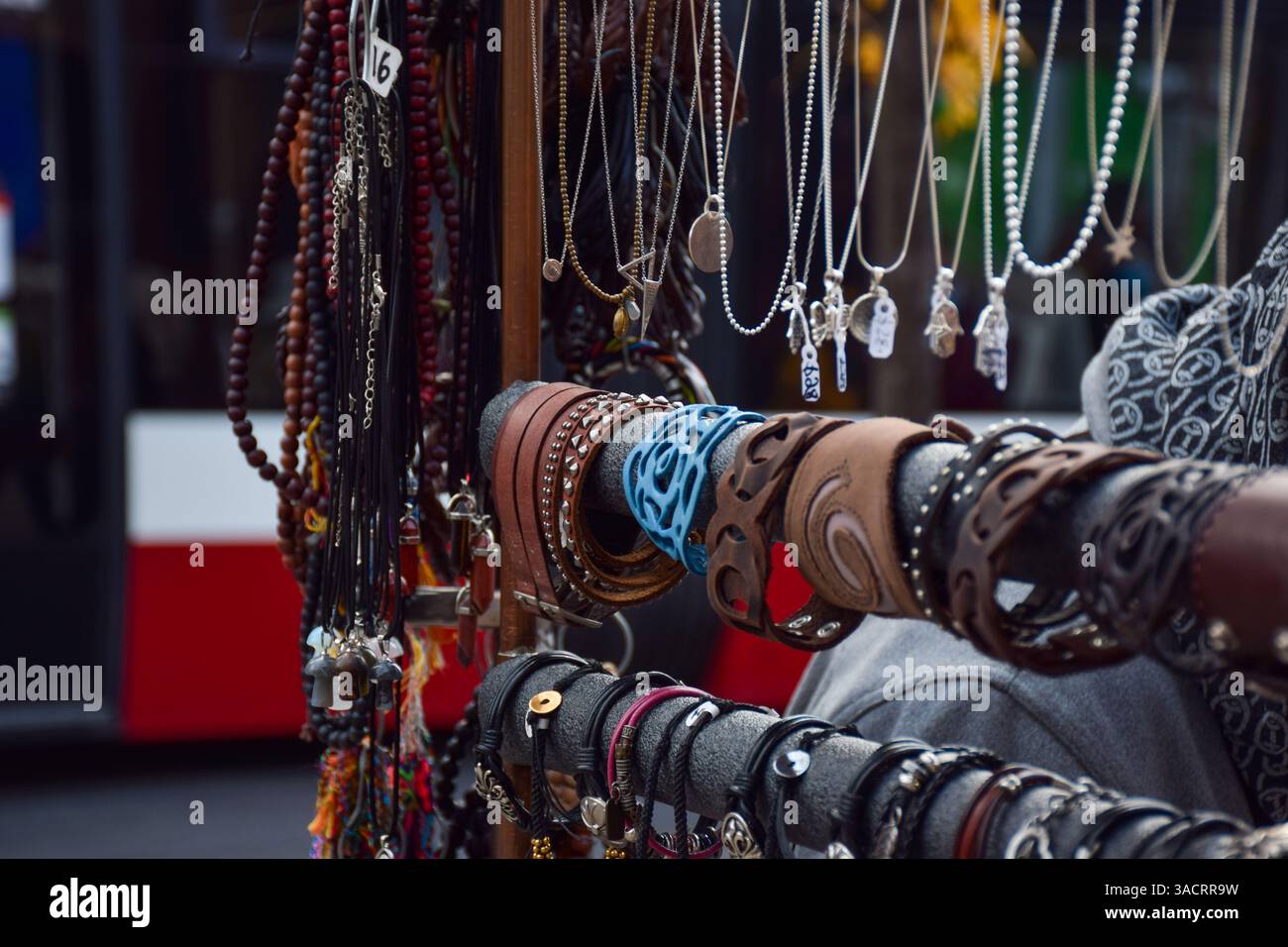 Handmade artisanal jewelry and accessories on display at a street ...