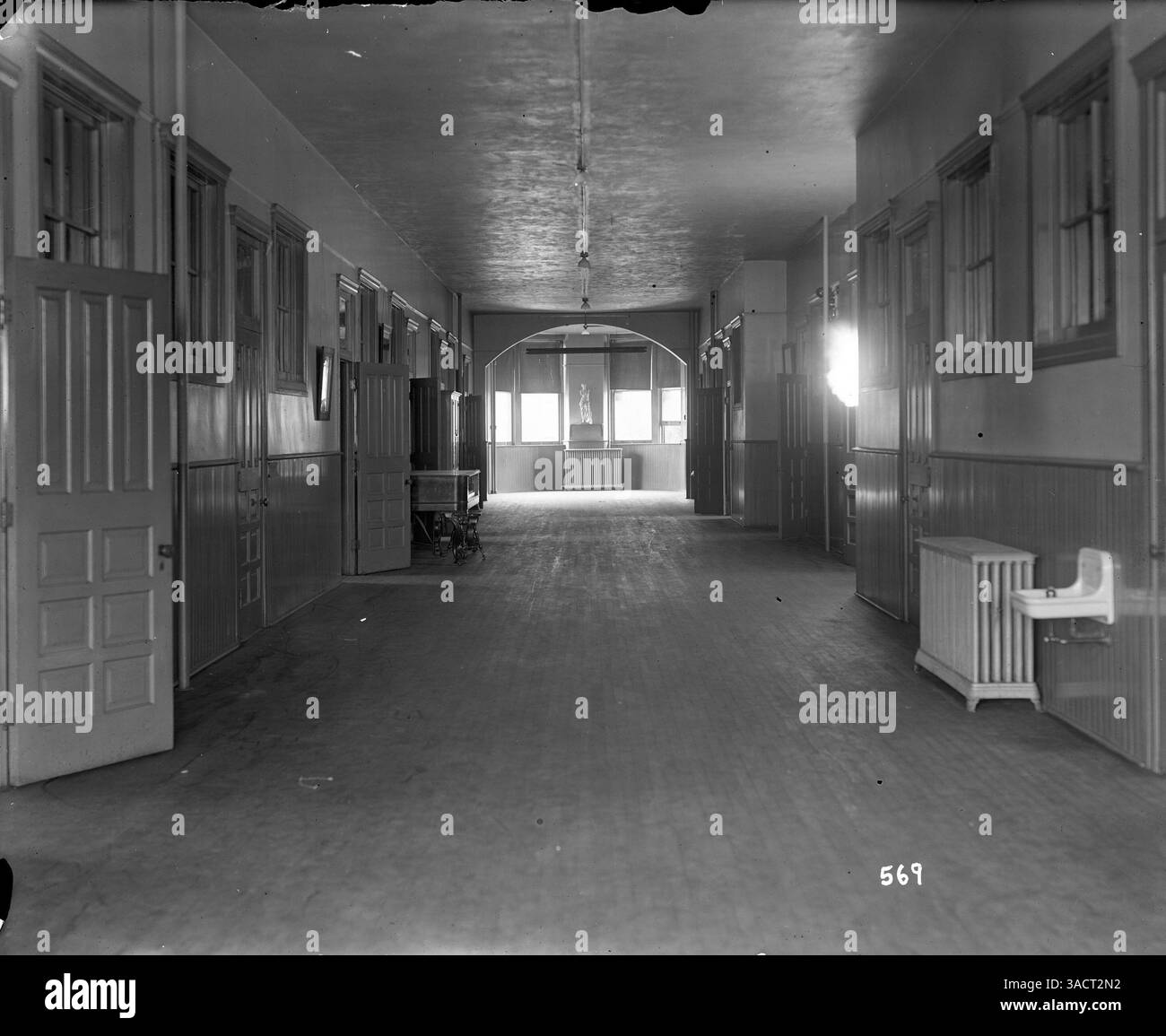 This photograph shows the first-floor corridor of Washington School ...
