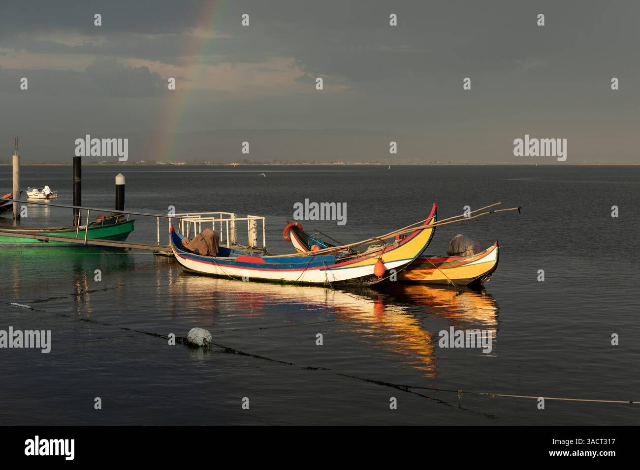 Wooden fishing boats rainbow in hi-res stock photography and images - Alamy