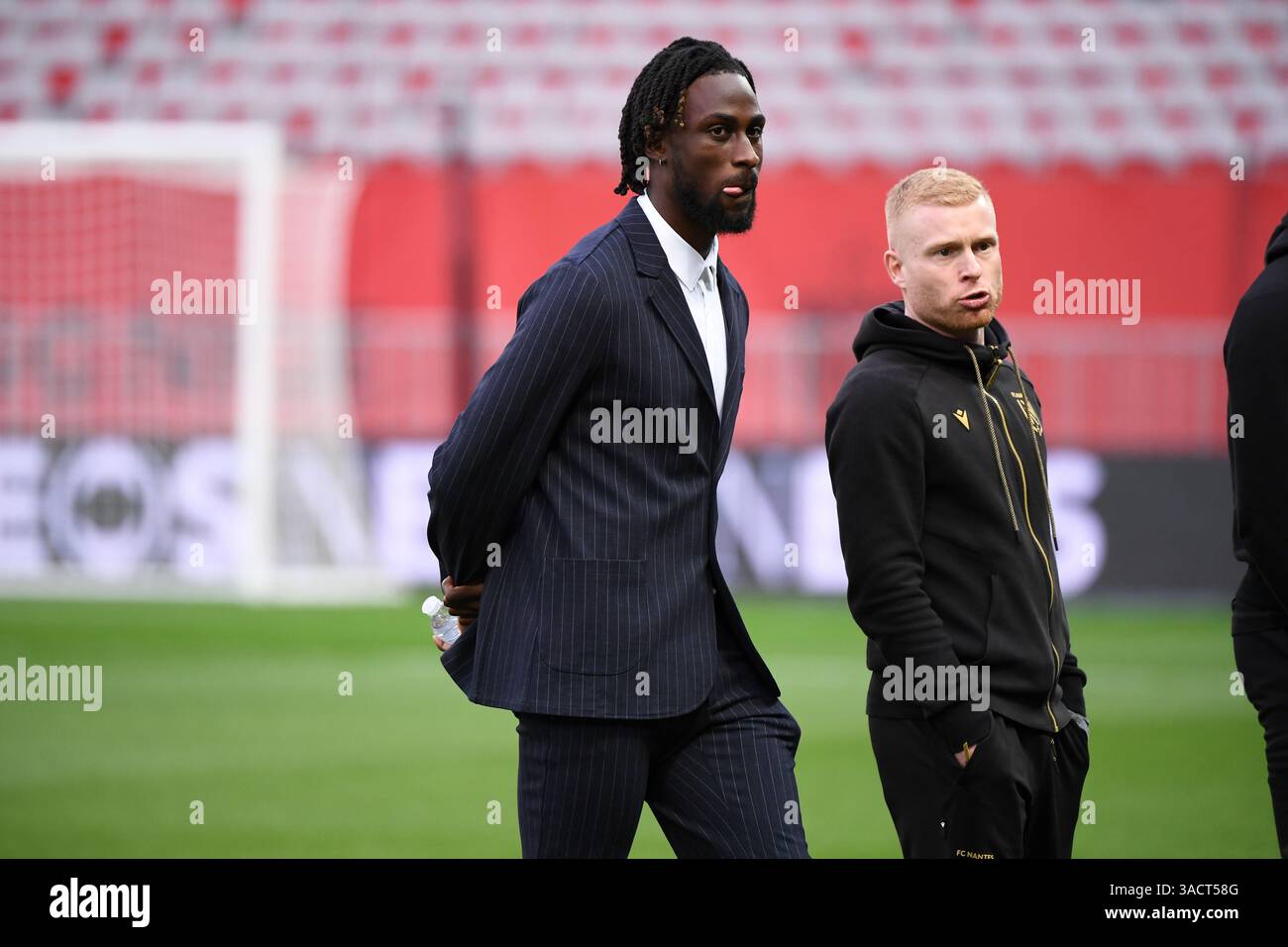 25 Florent MOLLET (fcn) - 29 Evann GUESSAND (ogcn) during the Ligue 1 ...