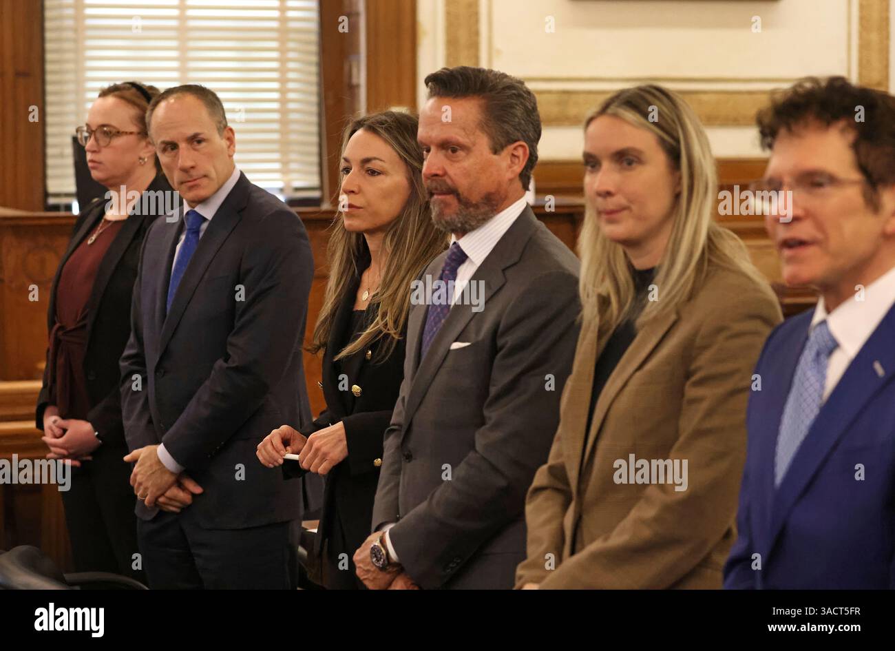 Member of the defense team, from left, Victoria George, David Yannetti ...