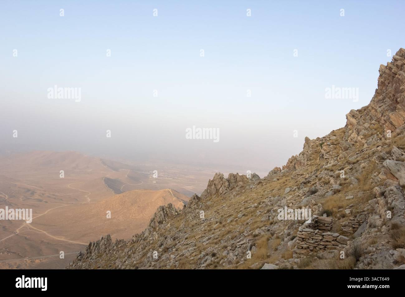 A captivating view of a rocky hillside overlooking an expansive ...