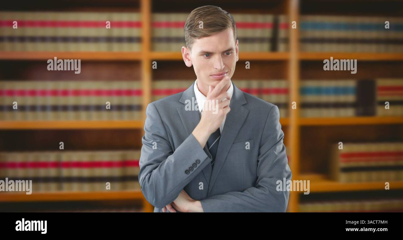 Businessman in suit thinking deeply in front of bookshelf in office ...