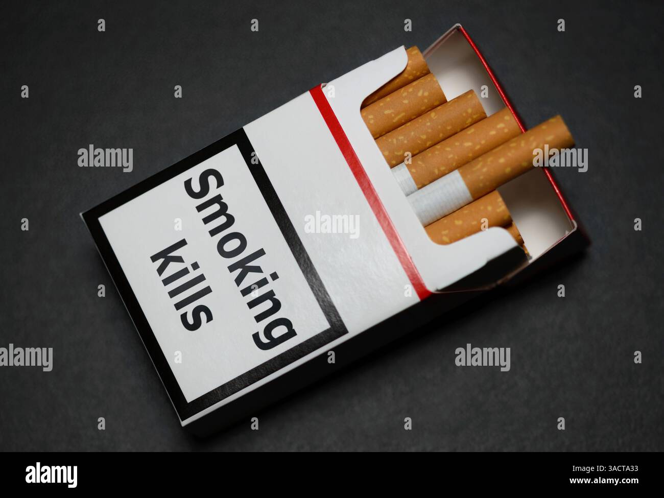 Cigarettes, Cigarette packet with warning Smoking kills Stock Photo - Alamy