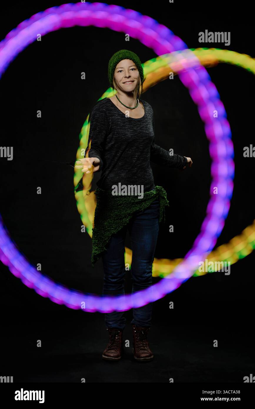 Woman with led juggling hi-res stock photography and images - Alamy