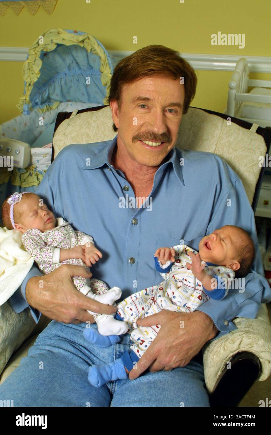 Oct 03, 2001; Los Angeles, CA, USA; CHUCK NORRIS holds his new twins ...