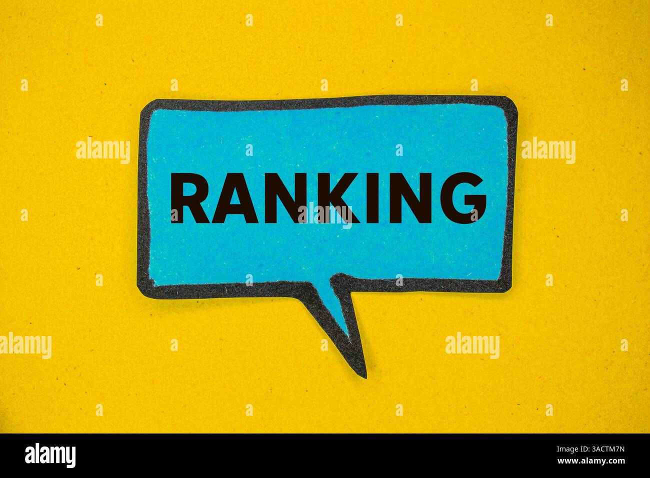 Ranking message written on blue paper speech bubble on yellow ...