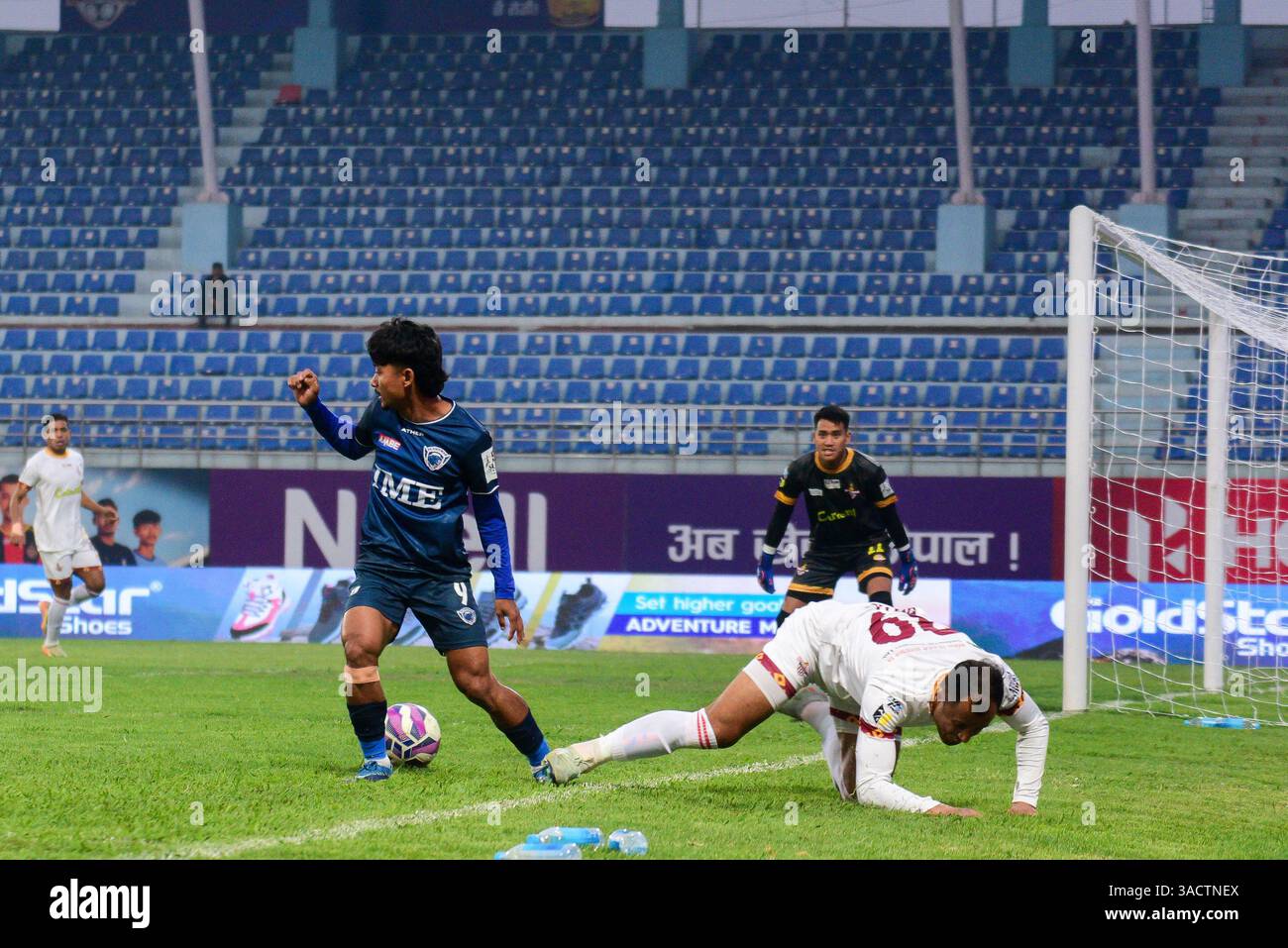 Kathmandu, Bagmati, Nepal. 4th Apr, 2025. SHISHIR LEKHI of FC Chitwan (blue) and BIMAL PANDEY of ...
