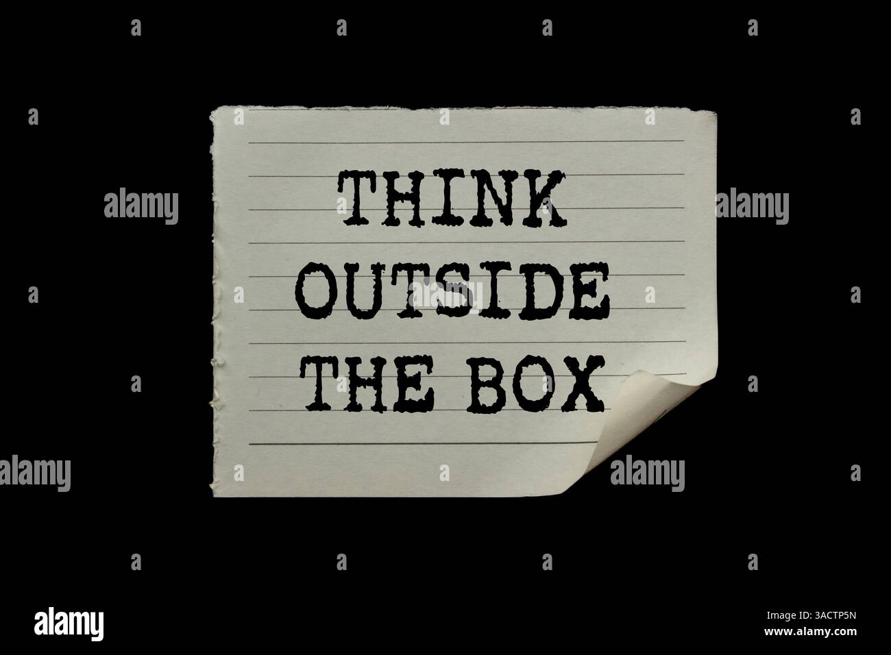 Think outside the box message written on ripped torn paper piece on ...