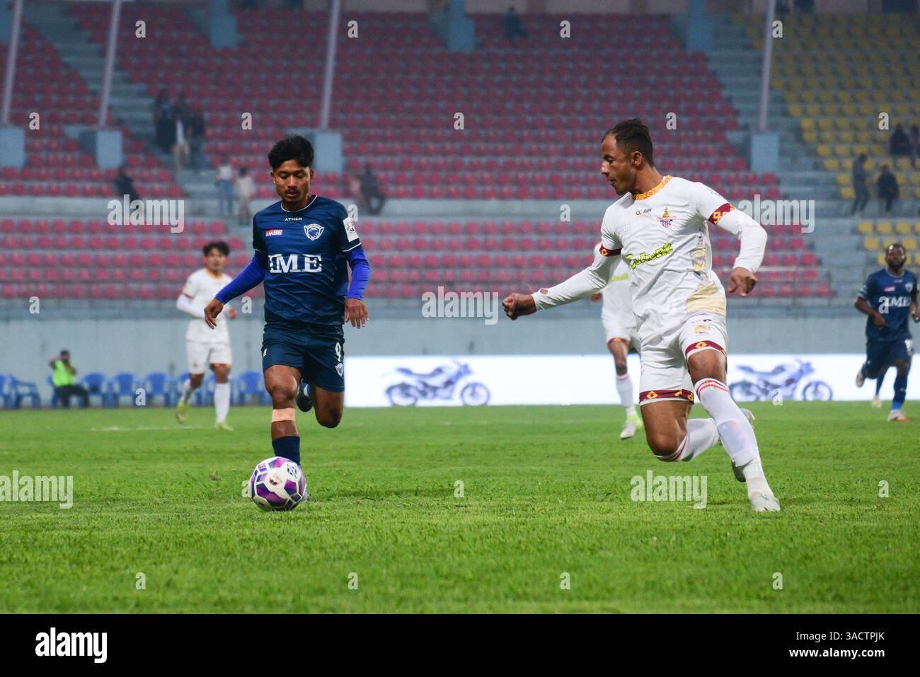 Kathmandu, Bagmati, Nepal. 4th Apr, 2025. SHISHIR LEKHI of FC Chitwan (blue) runs with the ball ...
