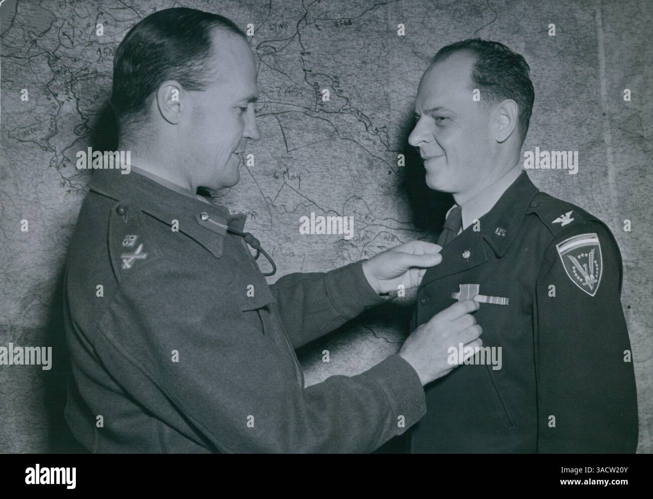 General H. Redman of the British Army presents an honorary award to ...