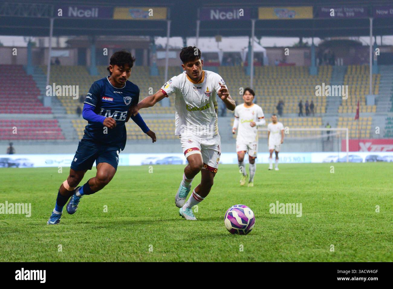 Kathmandu, Bagmati, Nepal. 4th Apr, 2025. SHISHIR LEKHI of FC Chitwan (blue) runs with the ball ...